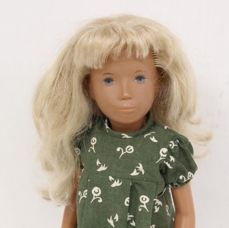Sasha: An unboxed Trendon Sasha doll, blonde hair, wearing a green and ...
