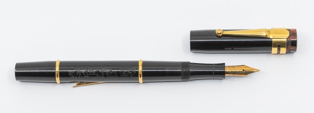 A vintage Mabie Todd & Co Swan self filling SF 2 lever black and gilt ...