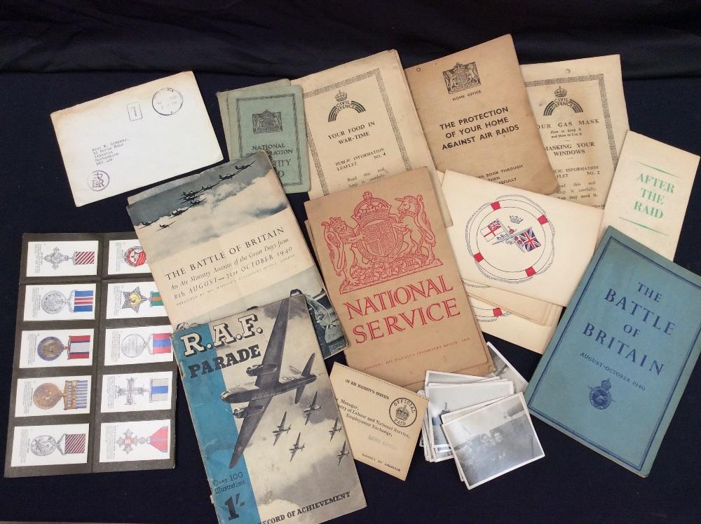 A collection of WWII pamphlets and information during war time, photos ...