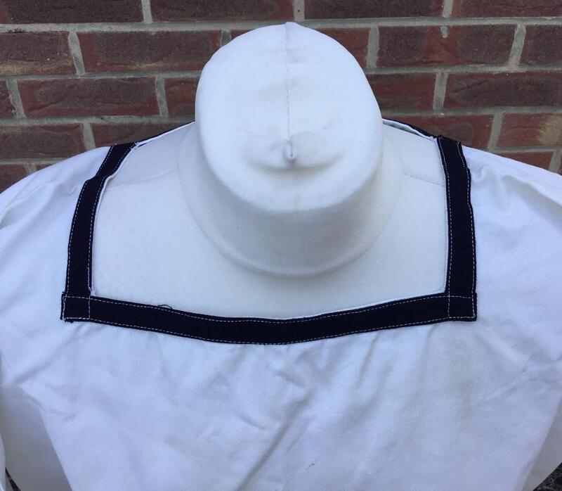 A collection of WW2 era Royal Navy square rig shirts, collars, cap ...