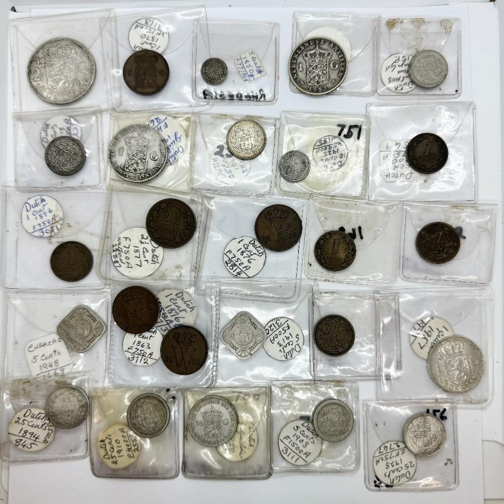 Collection of Dutch and Dutch colonial coins. See photographs for ...