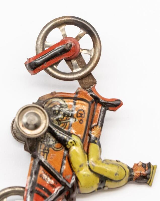 Kellermann: An early 20th century, lithographed tinplate penny toy motorcycle. Made in Germany ...