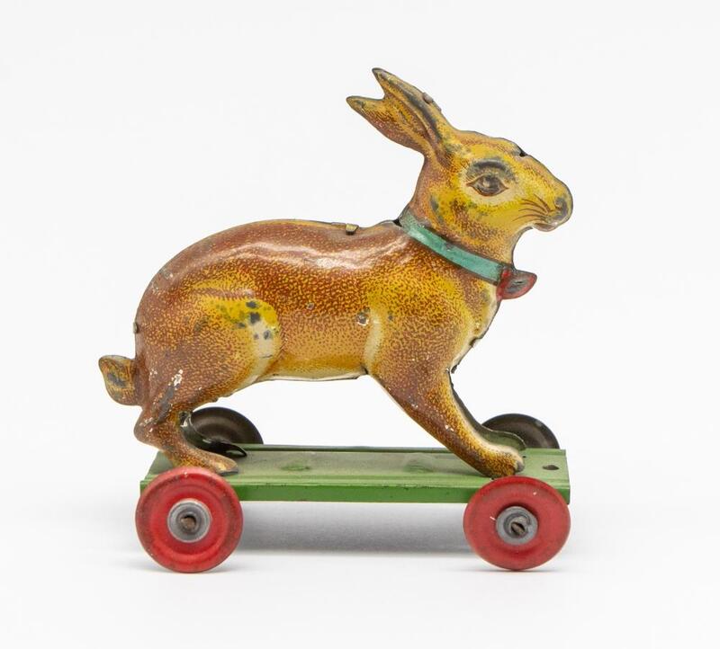 Meier: An early 20th century, lithographed tinplate penny toy seated ...