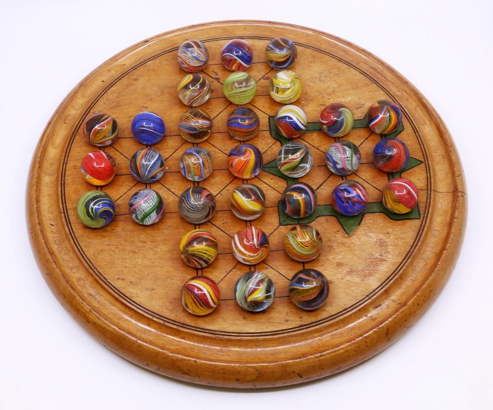 A collection of thirty-three various multi-coloured Victorian marbles ...