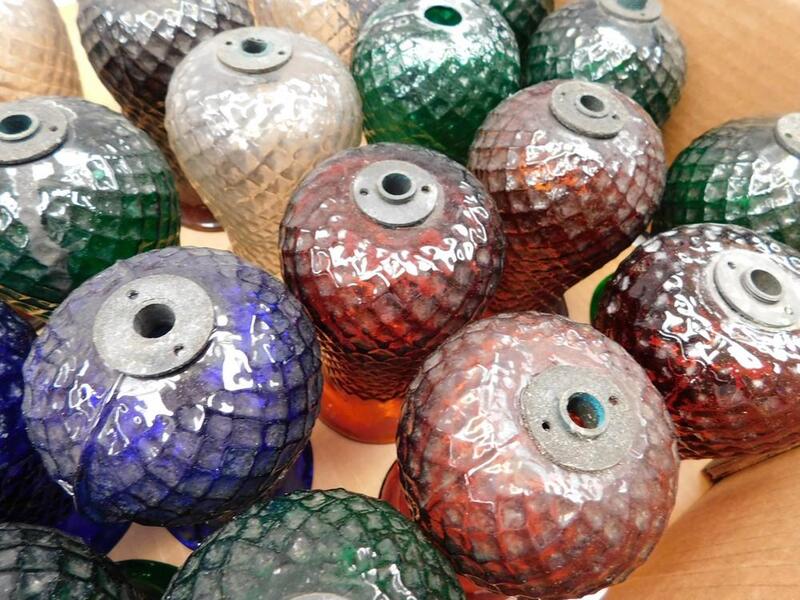 A collection of early to mid 20th Century coloured glass ware along ...