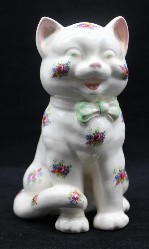 Clarice Cliff - 'Laughing Cat', decorated with transfer sprays of ...