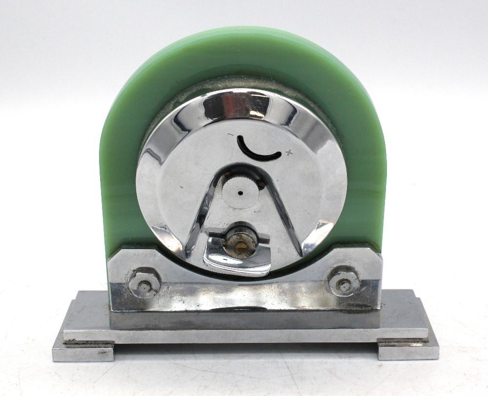 A 1930s 8 Tag mantle clock, green marble and chrome construction ...