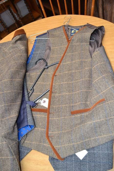 A Mark Darcy (London) country wear jacket, with velvet collar, piping ...