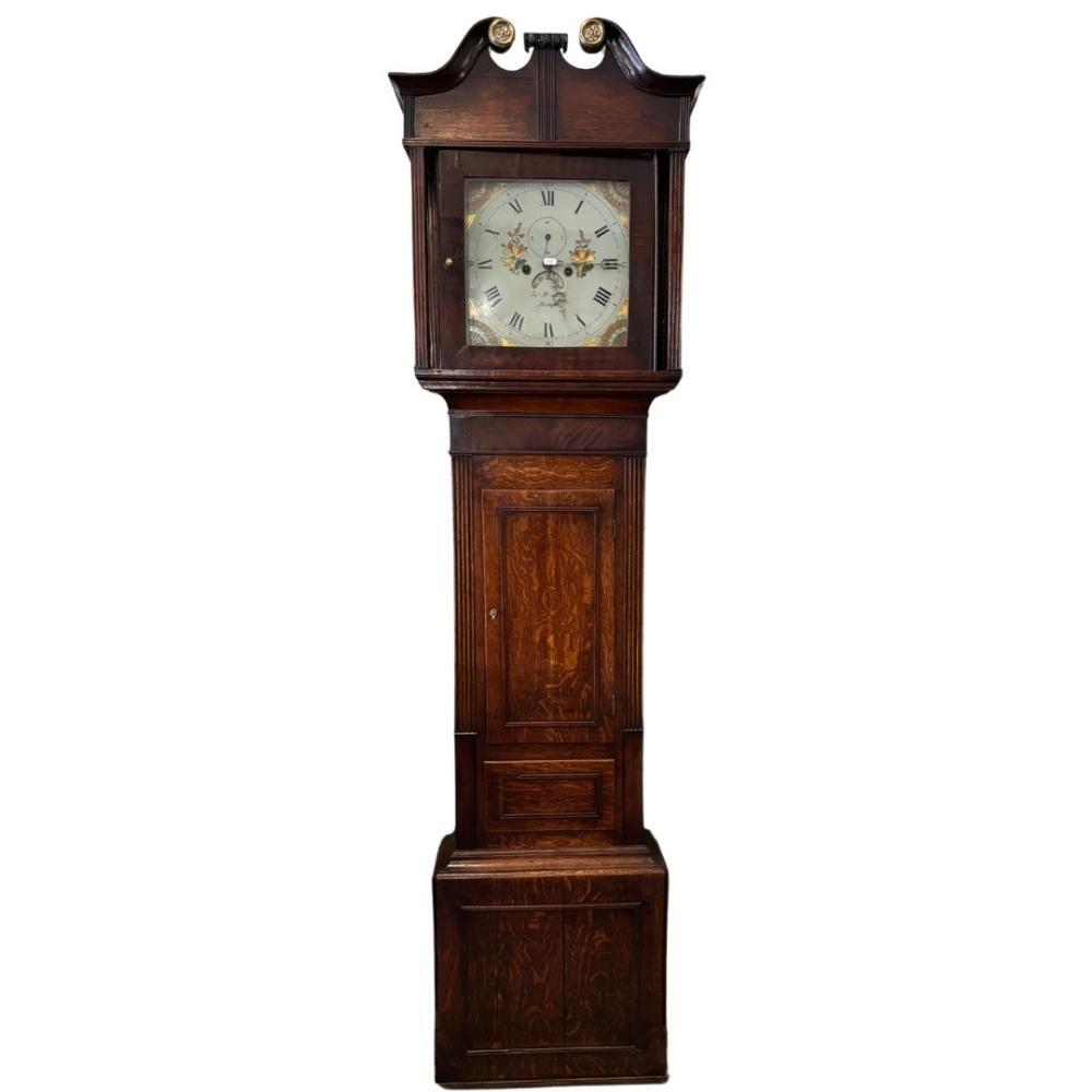 a George III oak longcase clock, the painted dial inscribed Jn Minshull ...