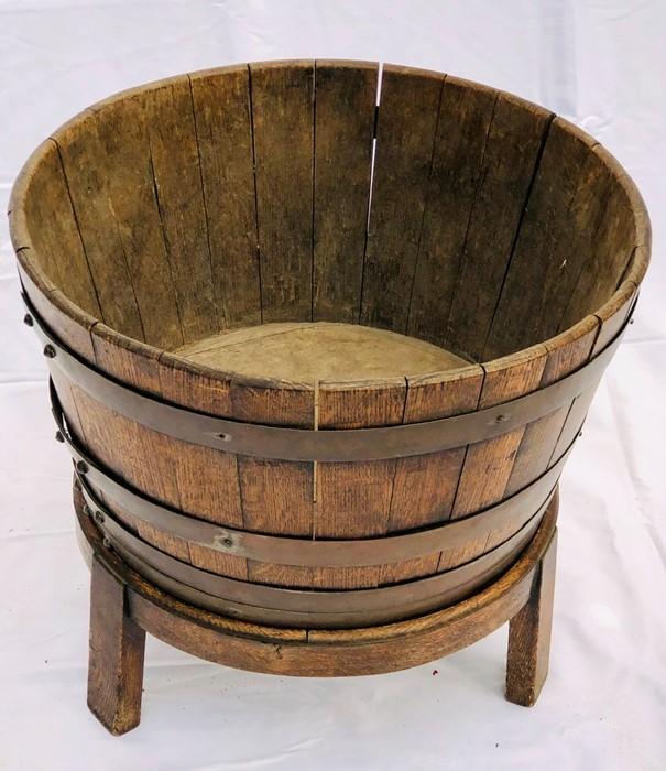 A George III revival coopered oak and brass mounted wine cooler on ...