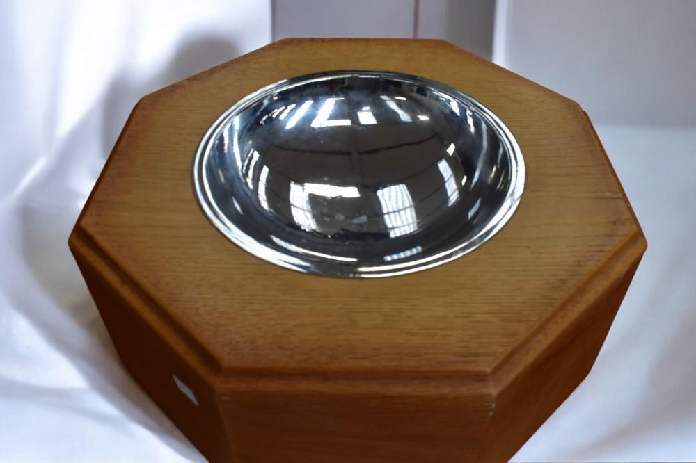 A mid 20th Century oak methodist church font with cover in a plain ...