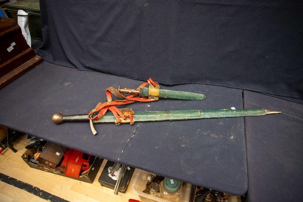 Medieval re enactment swords and dagger on belt