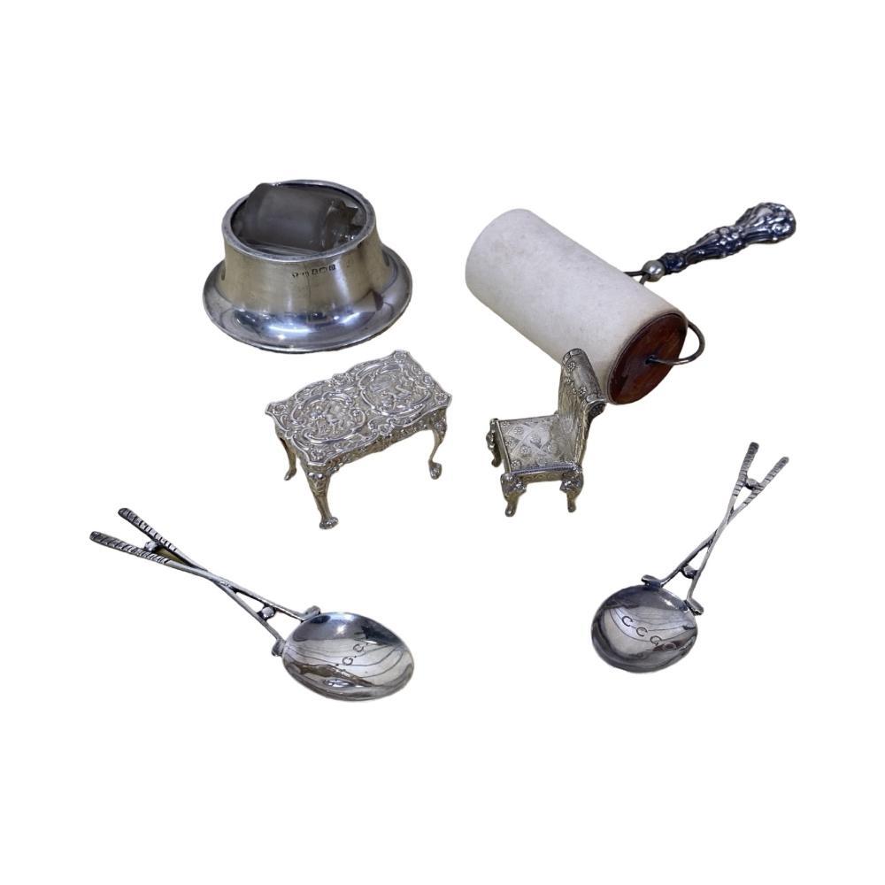 A mixed lot of silver: dolls house furniture, an ink blotter and stamp ...