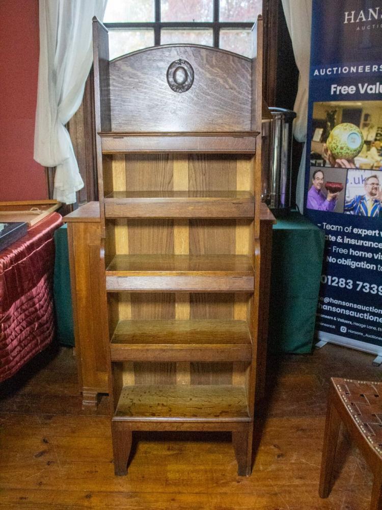 Arthur Simpson Arts and Crafts Oak tall slender bookcase with carved ...