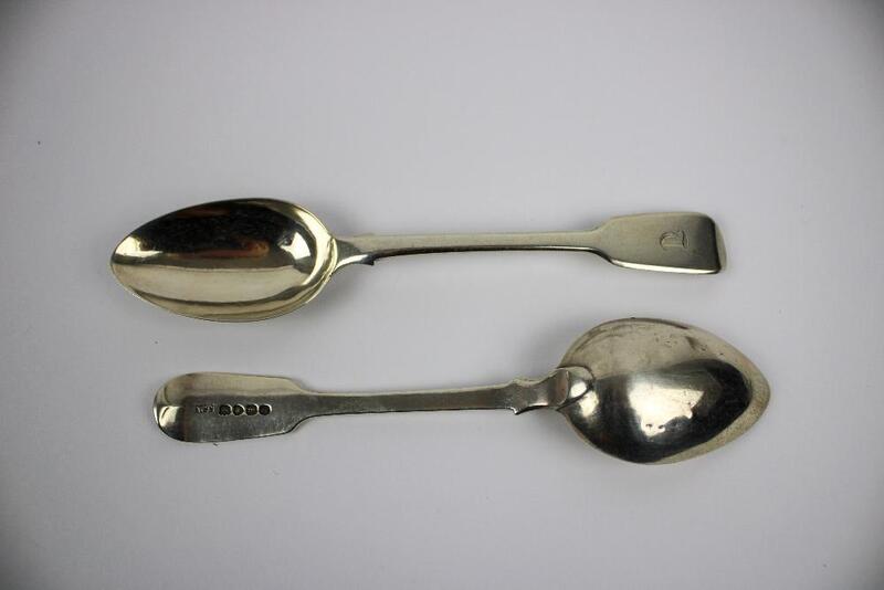 A group of Georgian silver fiddle back flatware, comprising nine desert ...