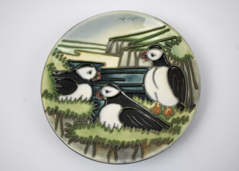 Moorcroft - A Moorcroft Puffins pin dish, dated 97, factory impressed ...
