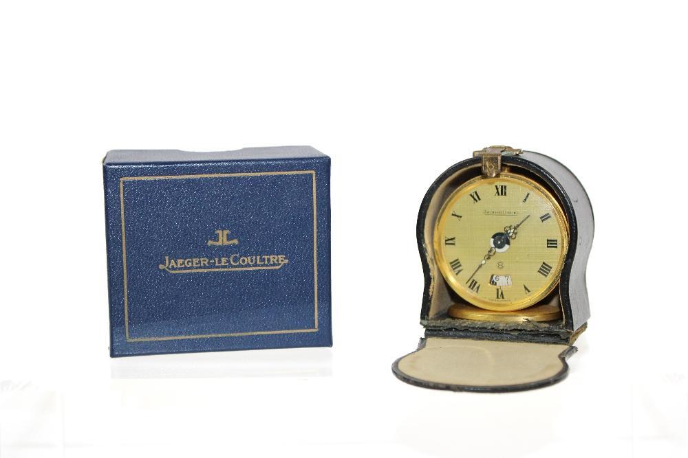 A Jaeger-Le-Coultre miniature eight day travel alarm clock , having a ...