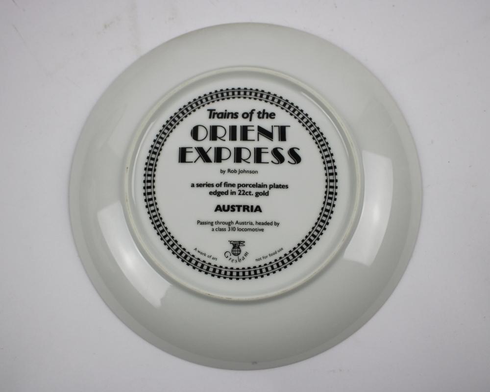 A collection of eight collectors plates of Trains of the Orient Express ...