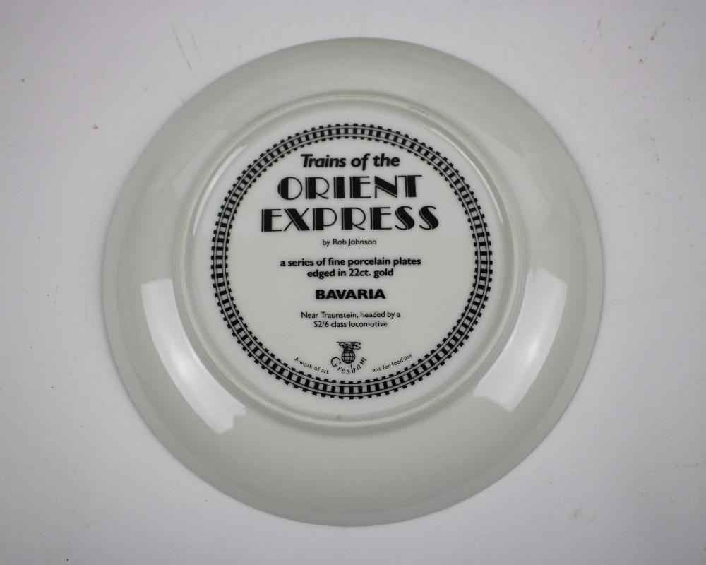 A collection of eight collectors plates of Trains of the Orient Express ...