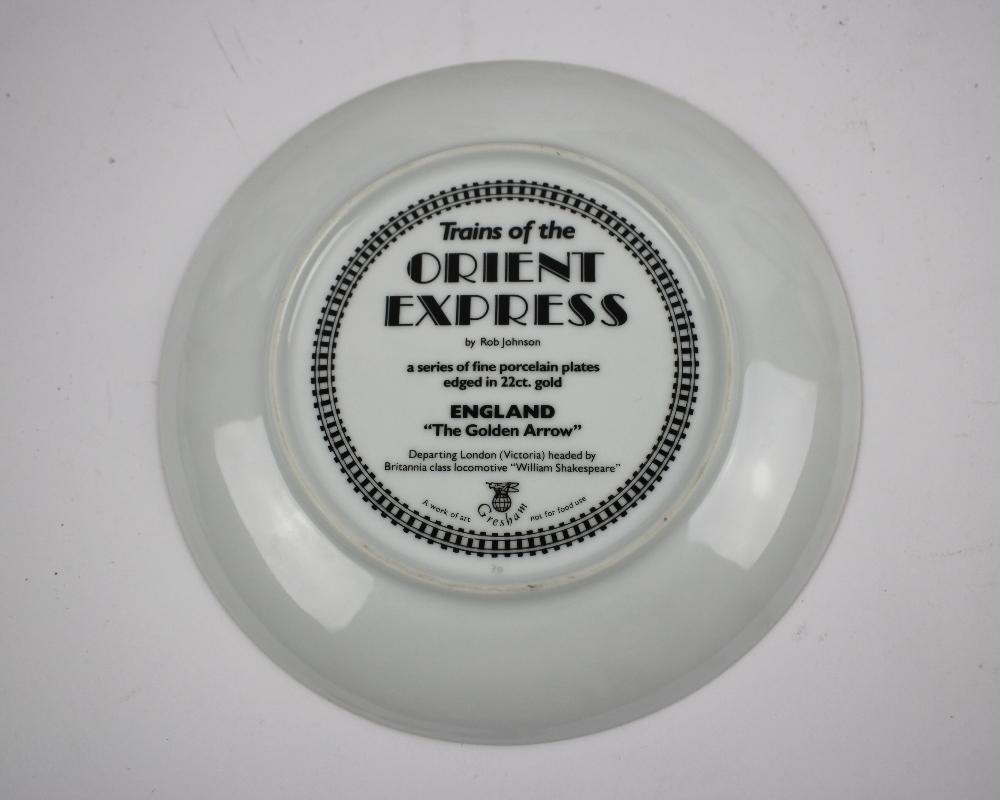 A collection of eight collectors plates of Trains of the Orient Express ...