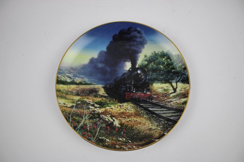 A collection of eight collectors plates of Trains of the Orient Express ...