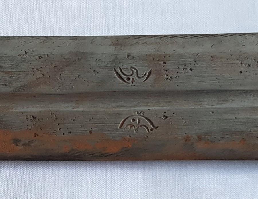 A Sudanese Kaskara sword, having flaring quillons and short langets, 88 ...