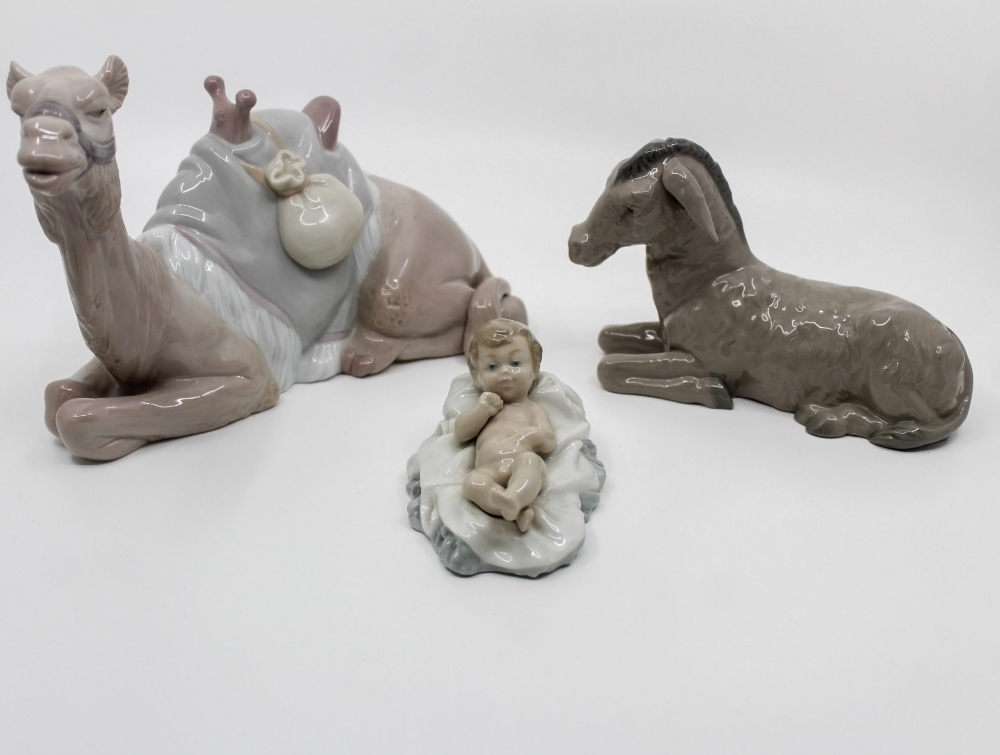 A Nao Nativity set comprising baby Jesus, Mary, Joseph, three Kings ...