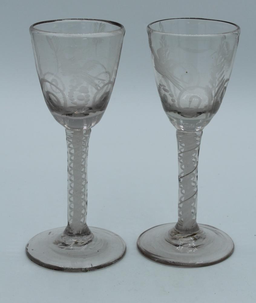 Two 18th century Low Countries engraved double opaque twist stem gin ...