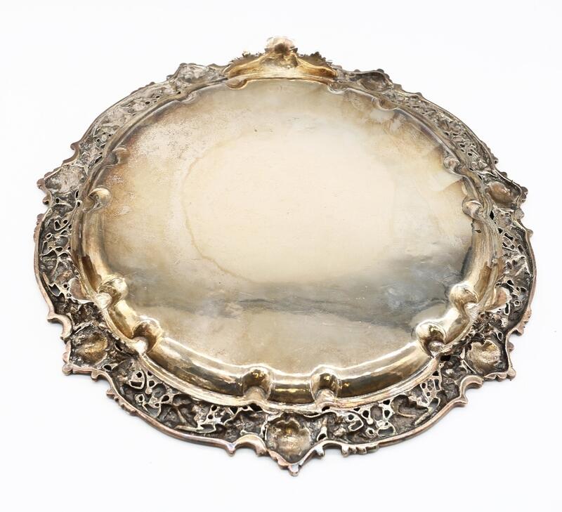 A Victorian silver salver, the border cast with vine leaves and grapes ...