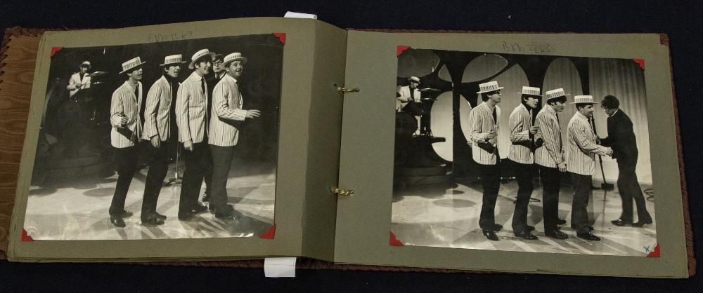 A photograph album featuring pictures of performers (annotated by Eric ...