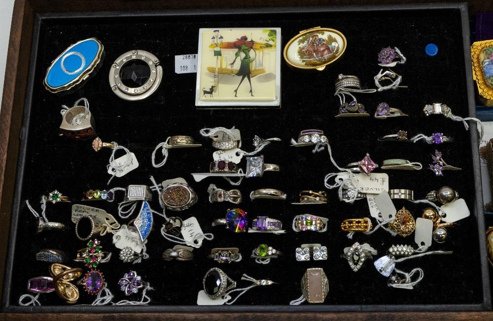 A large collection of silver, silver gilt and metal rings, including ...