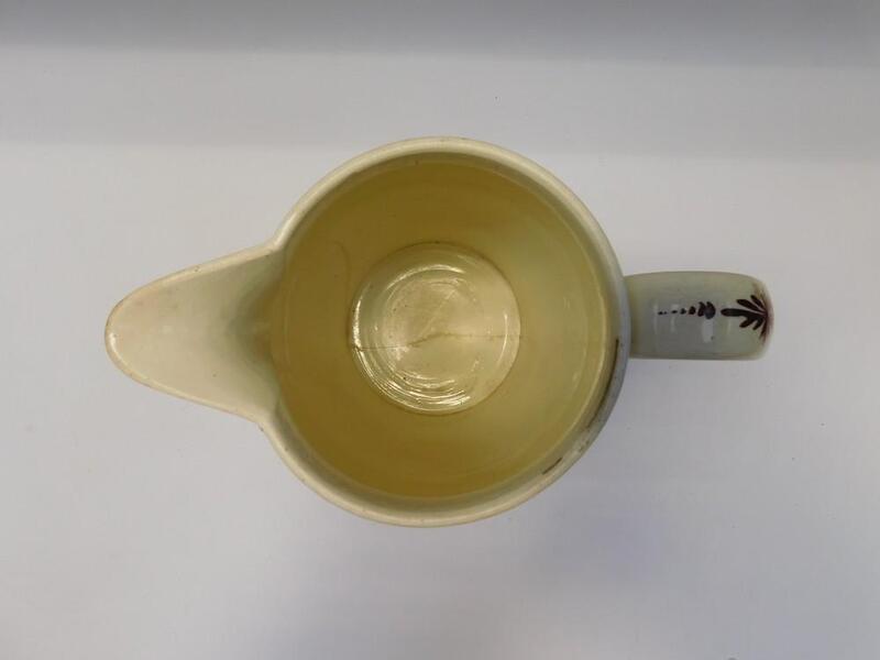 A large Leeds pottery creamware Masonic jug printed with Masonic ...