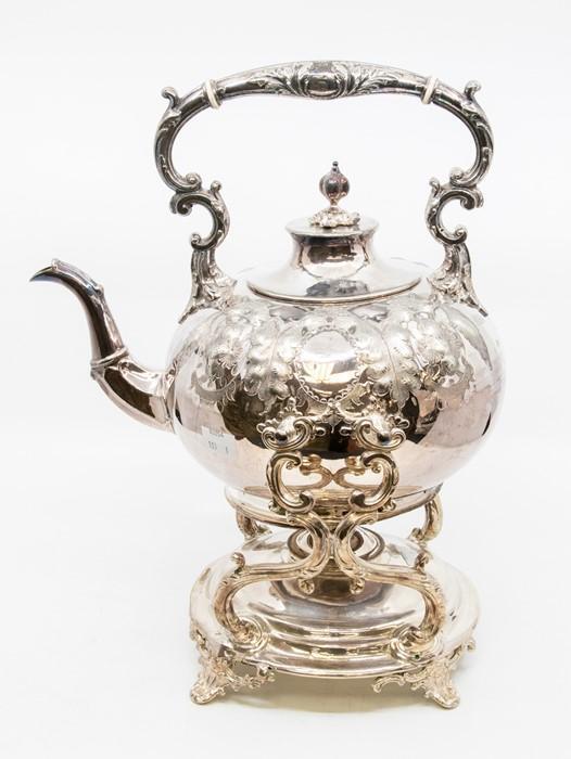 A Victorian plated kettle and associated stand and burner, the ornate ...