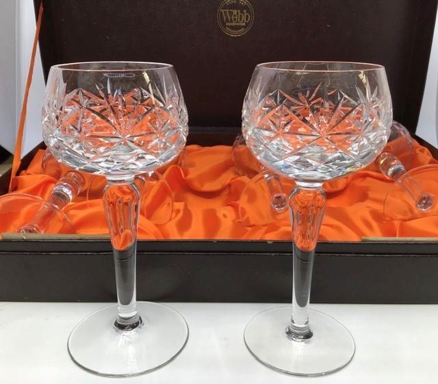 Webb hand cut two continental glass sets.