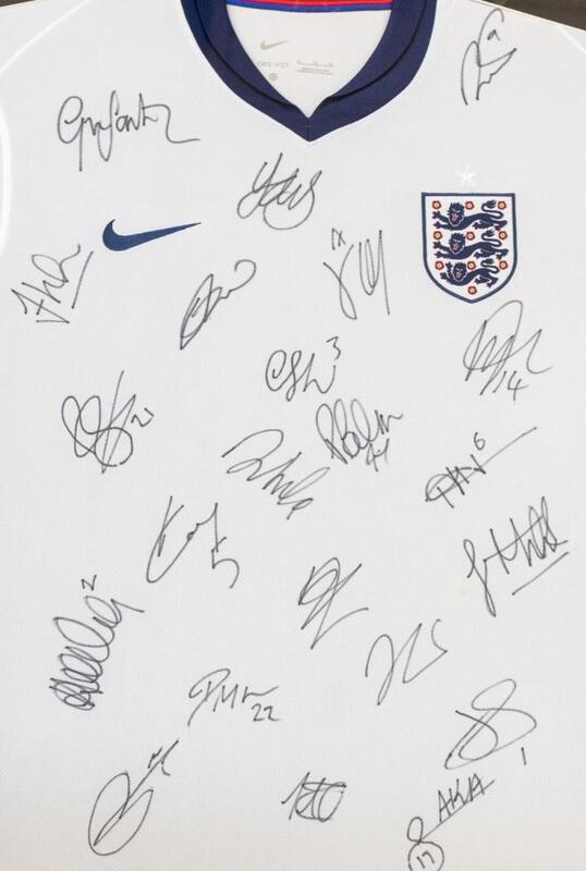 A framed Euro 2024 Umbro signed England football shirt; signed in black ...