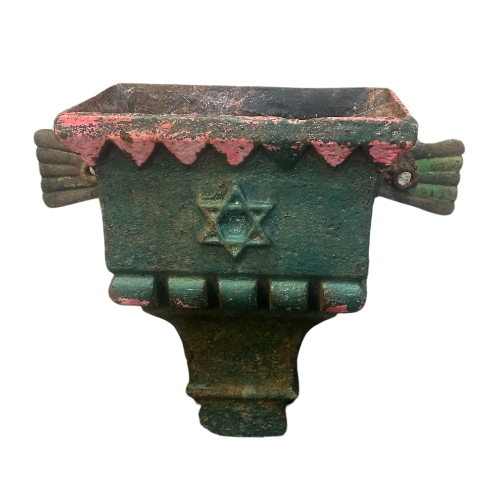 A Victorian cast iron rain hopper with Star of David design, height 38cm.