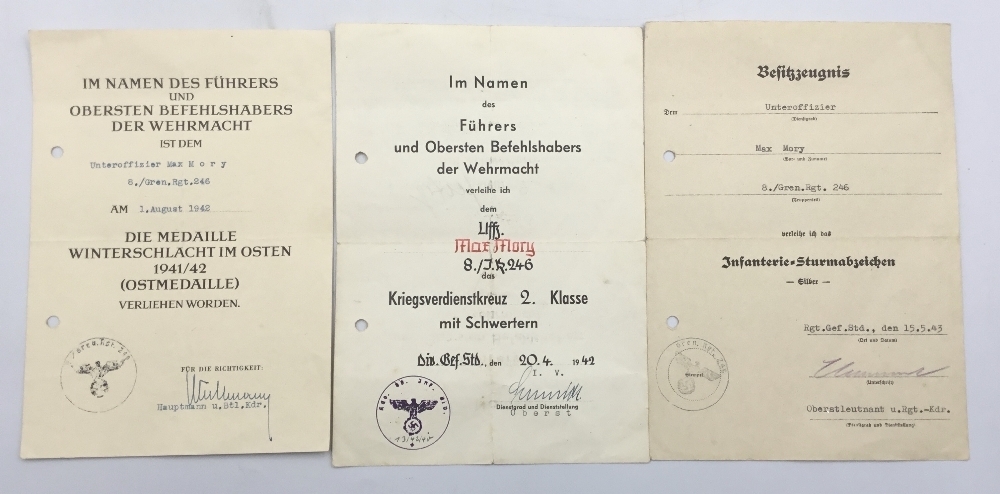 A small collection of original WW2 era German award certificates ...
