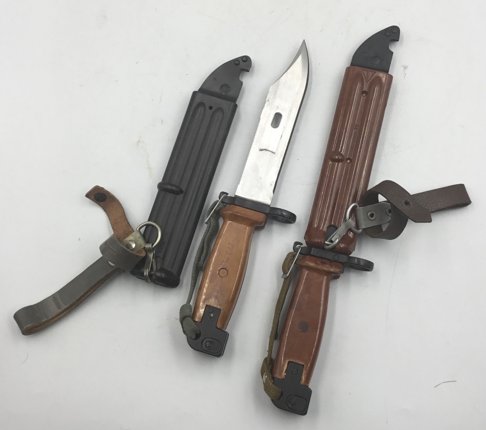 2 examples of the AKM Type II bayonet (AK47). Both with moulded plastic ...