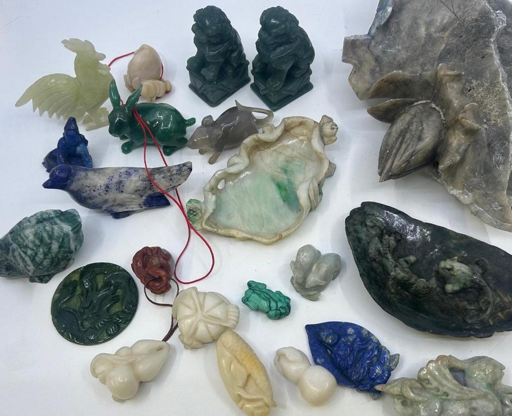 A large collection Chinese carved jade figures (qty)