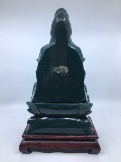 A green bakelite figure of Guanyin, height 30.5cm.