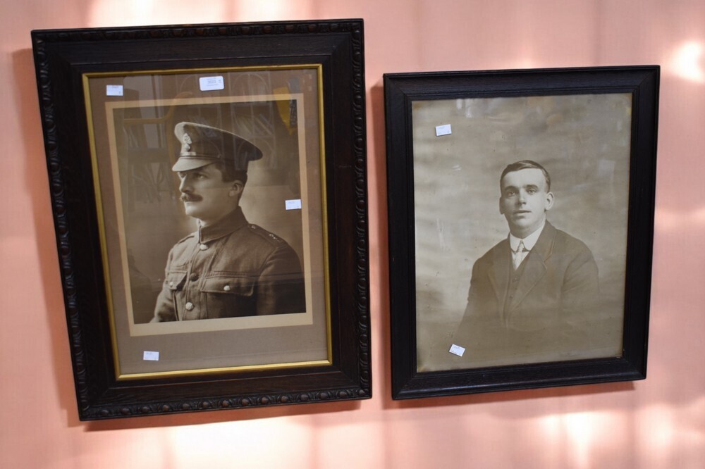 Two early 20th Century oak framed photographs of a WWI soldier and a ...