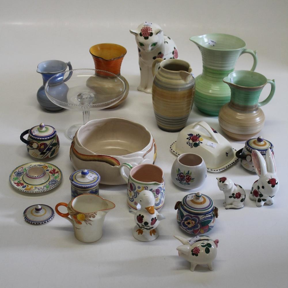 Five circa 1930's Shelley jugs, each with banded decoration, the ...