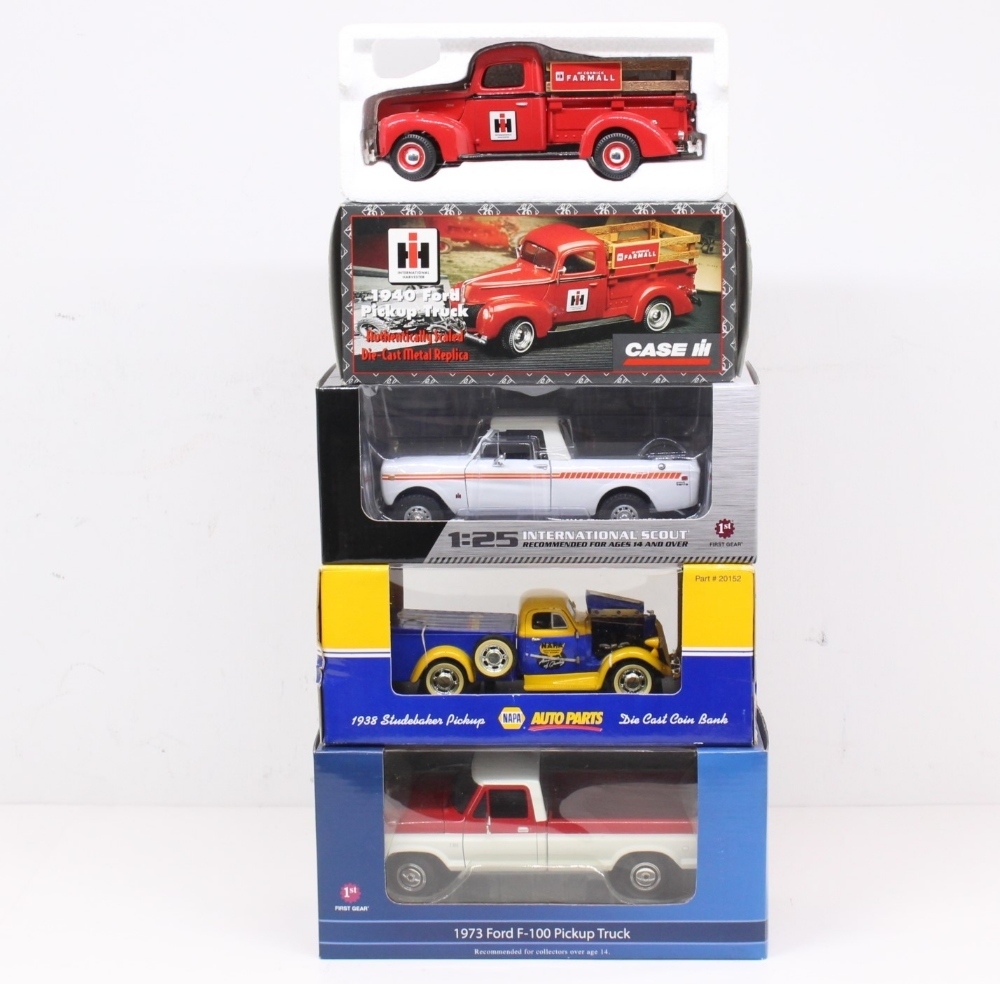 Diecast: A collection of four boxed diecast vehicles to include: First ...
