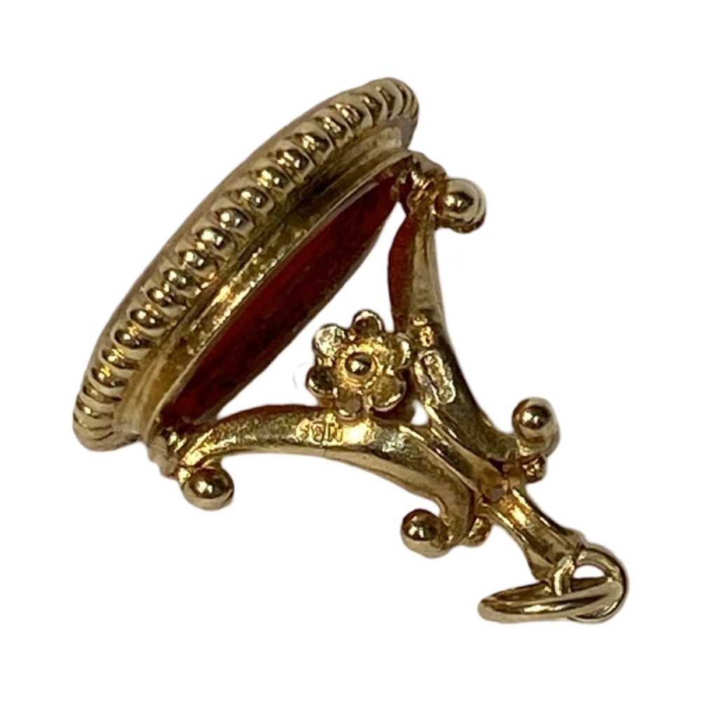 9ct gold and carnelian fob. Fob features an image of a centurion head ...