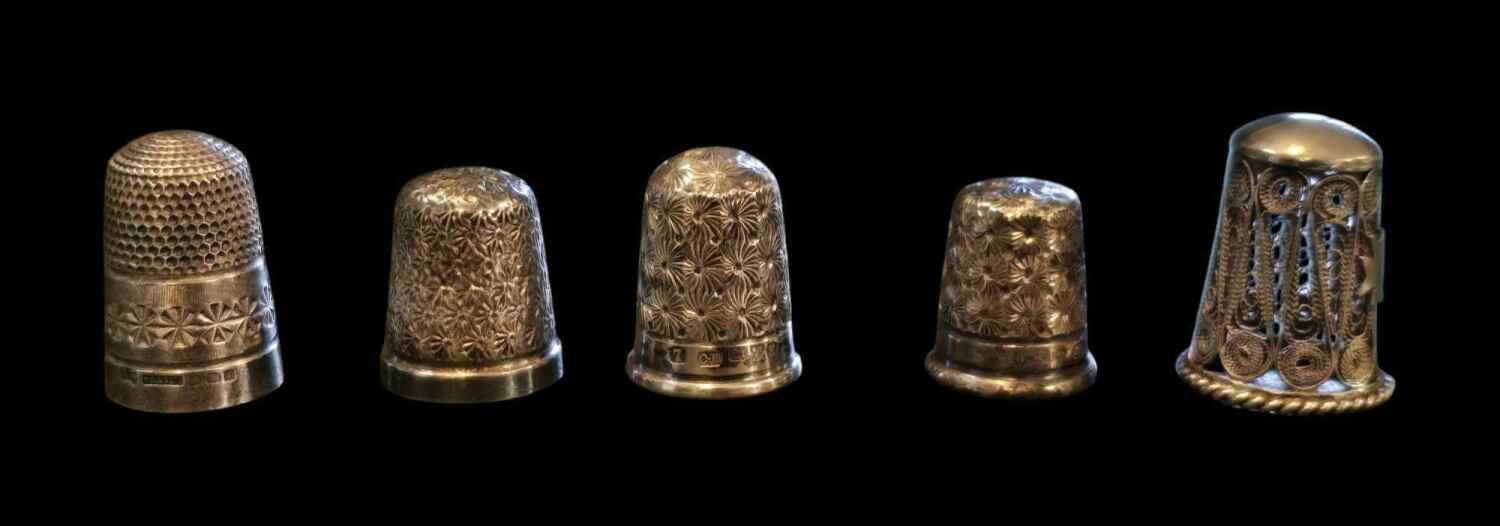 A collection of five silver thimbles. To Include two by Charles Horner circa 1900 - 1911 Two by ...