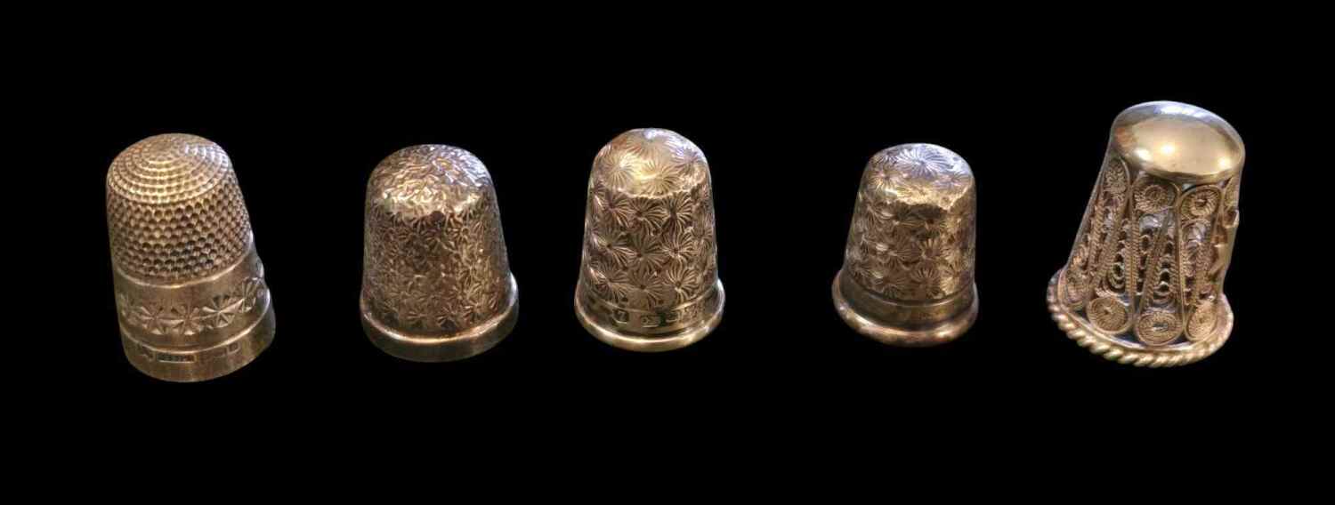 A collection of five silver thimbles. To Include two by Charles Horner circa 1900 - 1911 Two by ...