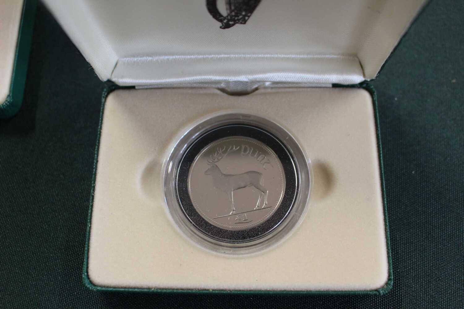 A collection of UK & Ireland cased uncirculated proof coin sets in ...