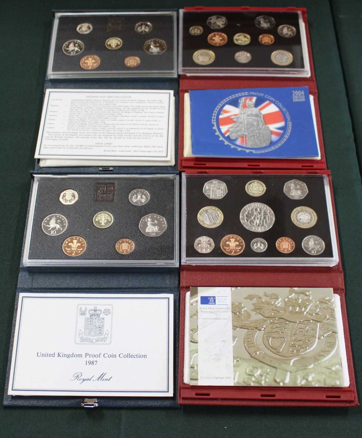A collection of cased uncirculated proof coin sets in presentation ...