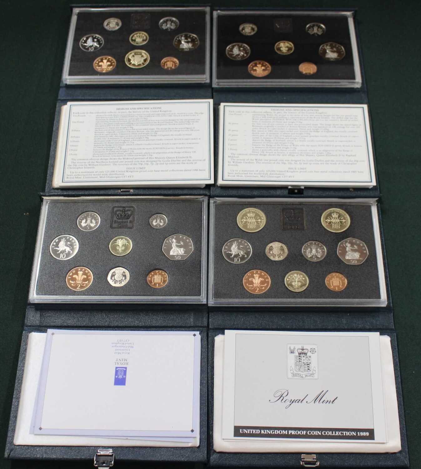A collection of cased uncirculated proof coin sets in presentation ...