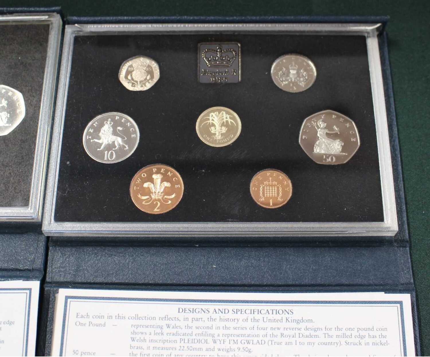 A collection of cased uncirculated proof coin sets in presentation ...